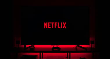 Why is Netflix stock beating the broader market today?