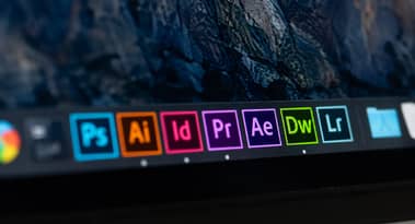 Why is Adobe stock sliding today despite earnings beat?